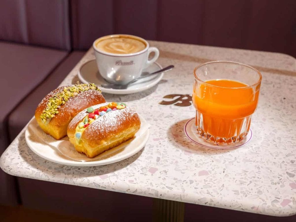 A filled Pandoro for breakfast, just steps from the Duomo of Milan: the ...