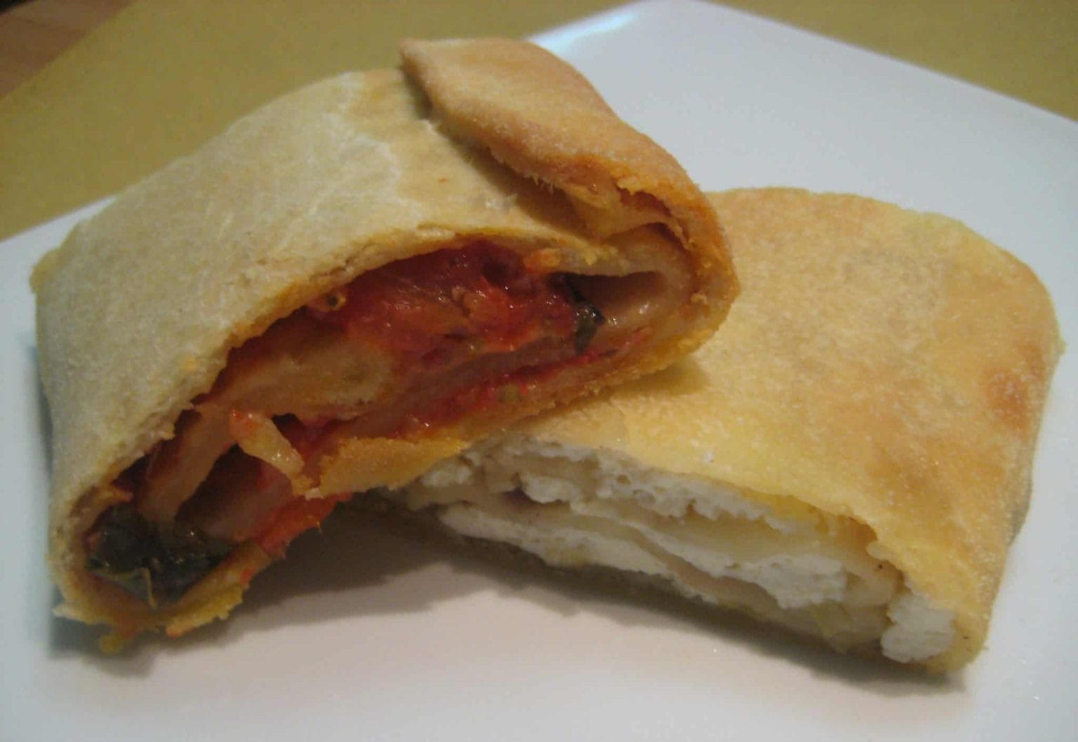 What is and where to find the "scaccia ragusana," the rolled focaccia ...
